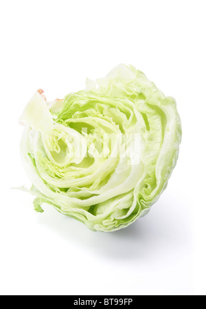 A vertical shot of a salad with iceberg lettuce cherry tomatoes and on ...