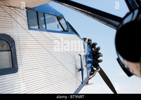 Nose and cockpit of Ford Tri-motor vintage airliner with radial engine ...
