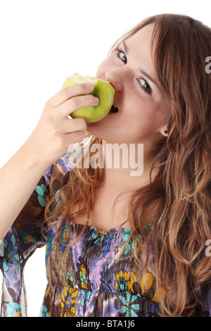 Teen girl eating grean apple isolated on white background Stock Photo ...