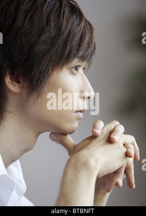 Profile view of Japanese man thinking in black and white Stock Photo ...
