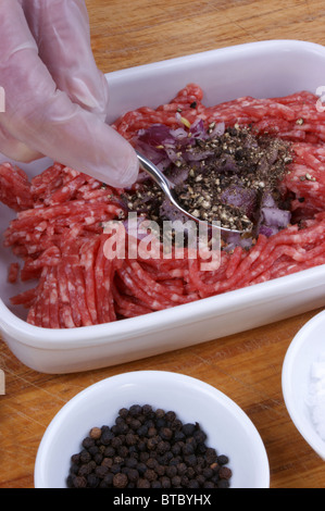 how to make home made pork tartar Stock Photo - Alamy