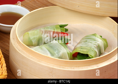 asian style chicken and vegetable bundles Stock Photo - Alamy