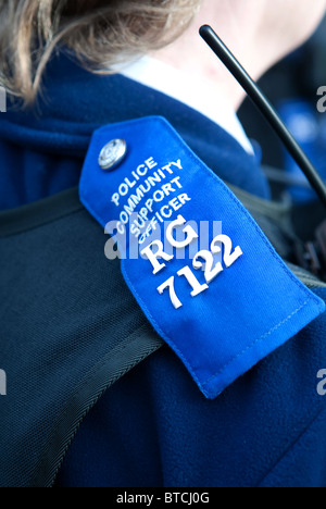 Female Police and Community Safety Officers or PCSO on duty providing ...