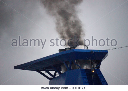 Blue chimney or smokestack on a ship used to expel boiler steam and ...