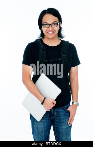 Young handsome student man holding a book over isolated background with ...
