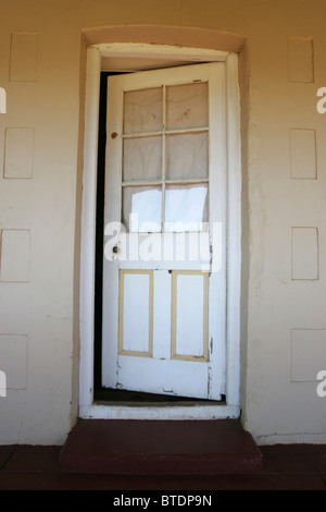 A door is open slightly, standing ajar inviting you to wonder what is ...