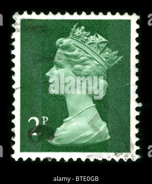 1st class stamp showing Queen Elizabeth II stuck on white envelope ...