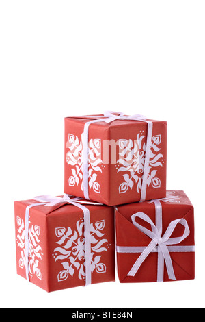 Three present boxes with red bow, christmas balls and snow fir-tree on ...