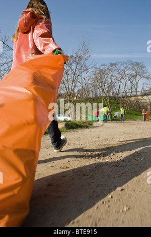 ROADSIDE LITTER CLEAN-UP. (FROM THE DOCUMERICA-1 EXHIBITION FOR OTHER ...