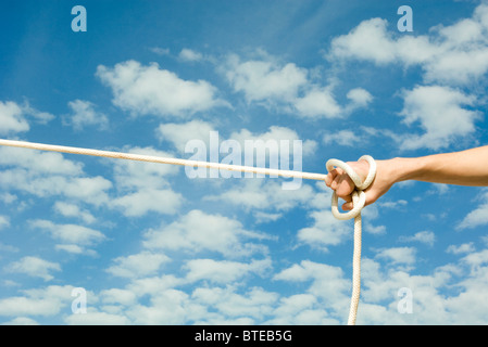 hold on to the rope Stock Photo - Alamy