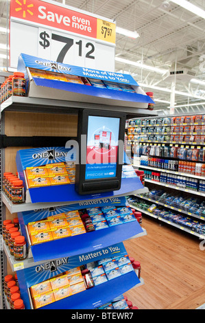 Digital signage on flat-screen monitor markets vitamins on end-cap ...