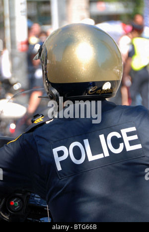 Ontario provincial police motorcycle officer patrolling in downtown ...