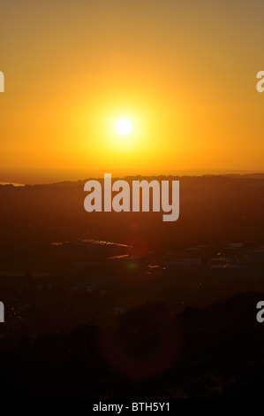 Sun setting on Folkestone Stock Photo - Alamy