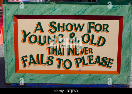 Old fashioned hand painted advertising sign on the side of a UK house ...