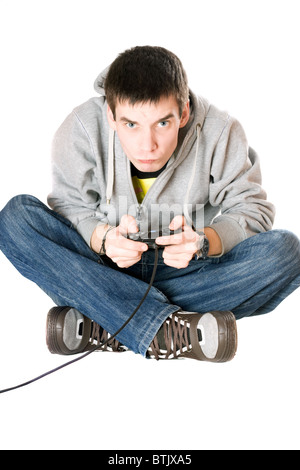 Guy young adult man gamer playing video game on game console at ...