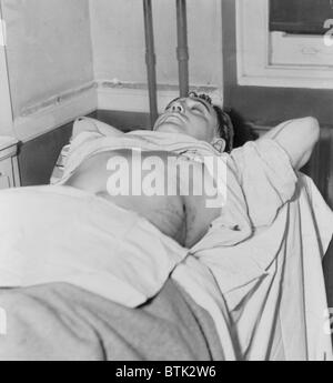 Dutch Schultz, born Arthur Flegenheimer (1902-1935), lying wounded in ...