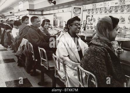 African Americans sit in protest at a whites-only lunch counter in ...