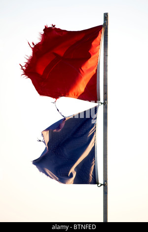 Red flag warning of dangerous currents at the sandy beach at West ...