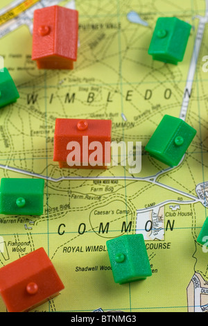 Monopoly houses on a street map Stock Photo - Alamy
