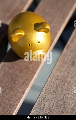 Piggy bank on wood table. Saving money wealth and financial increased ...