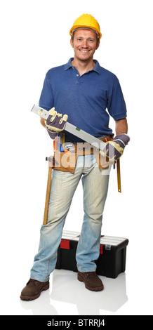 Repairman holding spirit level and hardhat Stock Photo - Alamy