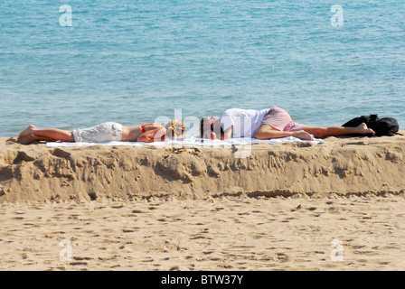 People sunbathing on the beach at Cannes, France Stock Photo: 31335098 ...