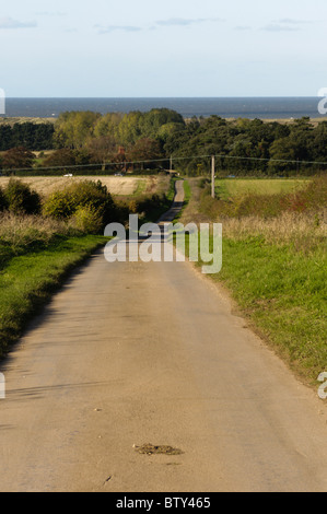 Typical country lane behind Thornham on the north Norfolk coast ...