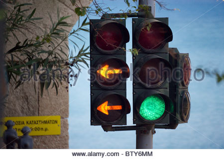 Traffic light with green arrow left and right turn signal against Stock ...