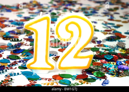 Number 12 (number twelve) anniversary celebration design with round ...
