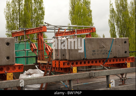 Scaffolding Concrete Counterbalance weights on bridge Stock Photo - Alamy