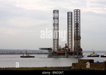Oil, gas rig being towed past Teesside Offshore Wind farm at Redcar on ...
