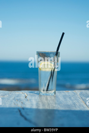 Light refraction glass of water and straw Stock Photo - Alamy