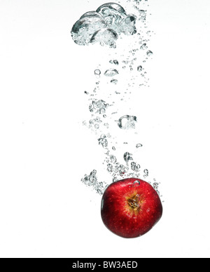 Water splash with apple isolated Stock Photo - Alamy