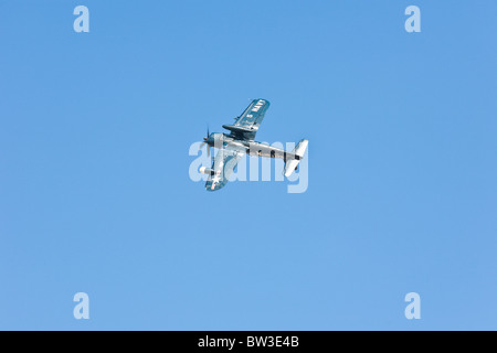 Pilot Dan McCue flying his F4U Corsair airplane during air show at NAS ...
