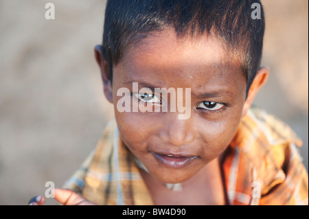 A selective focus of an Indian poor village old man in village attire ...