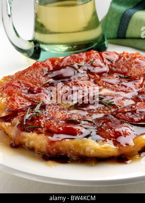 Ripe red baked tomato with savory corn and grain filling with chopped ...