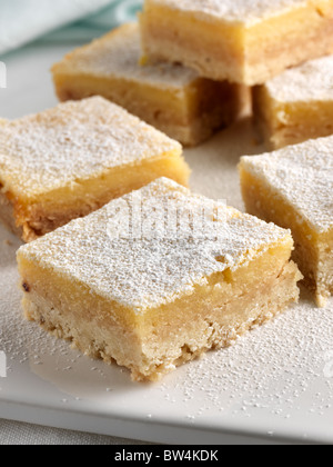 Lemon squares with powdered sugar Stock Photo - Alamy