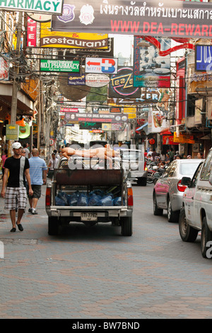 People walking on the main & busy street at daytime. Street scene ...