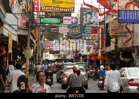 People walking on the main & busy street at daytime. Street scene ...