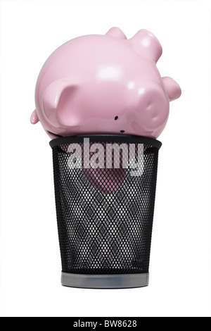 Piggy bank trash Stock Photo - Alamy