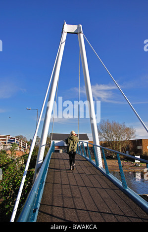 A pedestrian bridge over the River Bure on the Norfolk Broads at ...