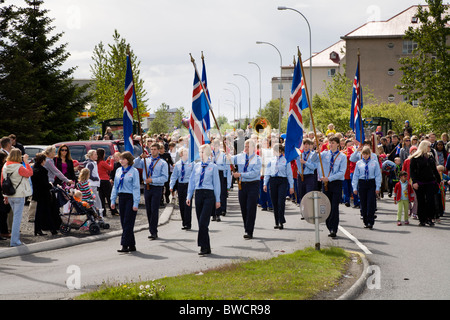 Girl Scout holding flag during June 17th, Iceland´s Independence Day ...
