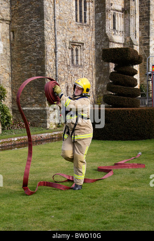 Firefighters, Firemen, Hoses Stock Photo - Alamy
