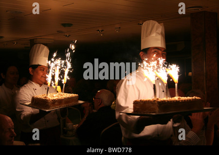 Waiter’s parade, Captains dinner aboard a river boat cruise, on the ...