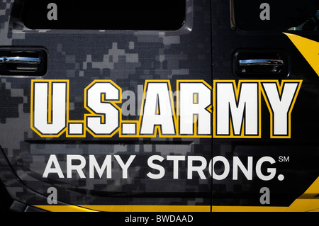 Advertisement advertising ad for US military army strong on side of ...