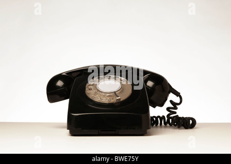 black old bt telephone on white background Stock Photo - Alamy