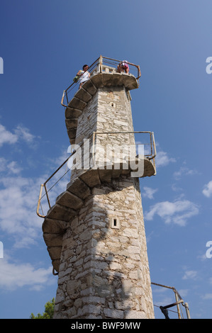 Tourists climbing on famous Toreta Tower, icon of Silba Island, Croatia ...