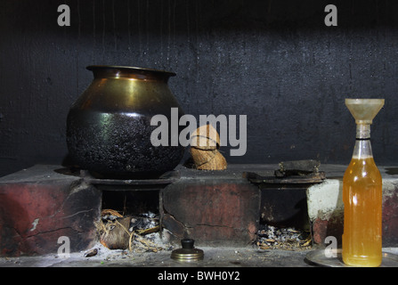 Indian cook in indian kitchen, India, Andaman Islands, Havelock Island ...