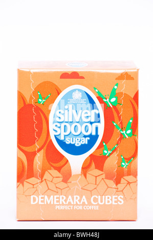 Sugar white and brown in cubes, granulated in a spoon and crystal on a ...