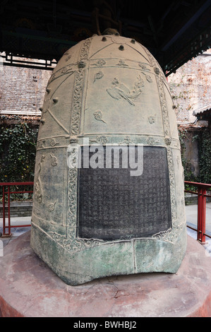ancient bell with Chinese inscriptions Stock Photo - Alamy
